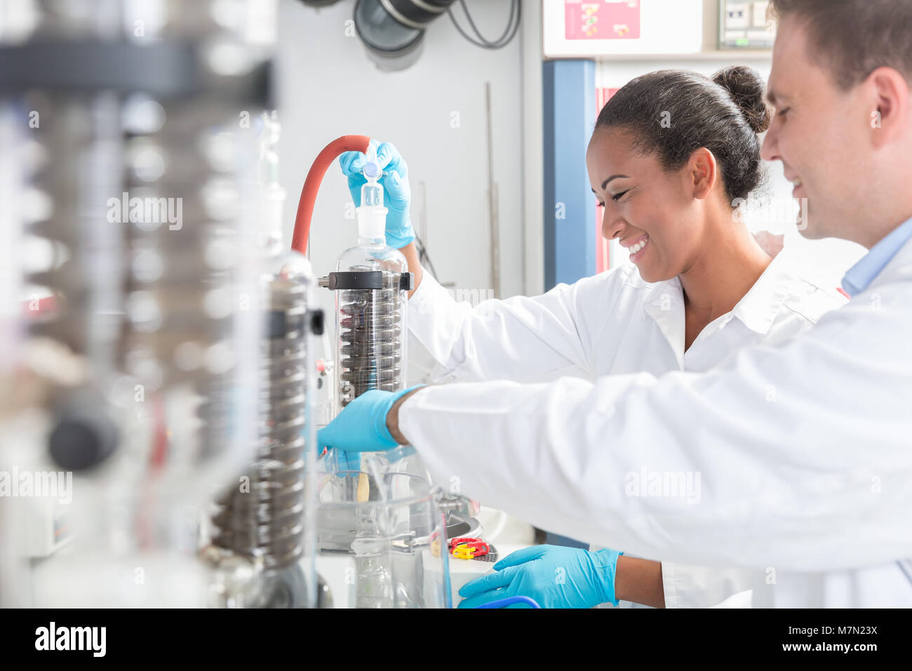 Researchers preparing test in scientific laboratory Stock Photo - Alamy