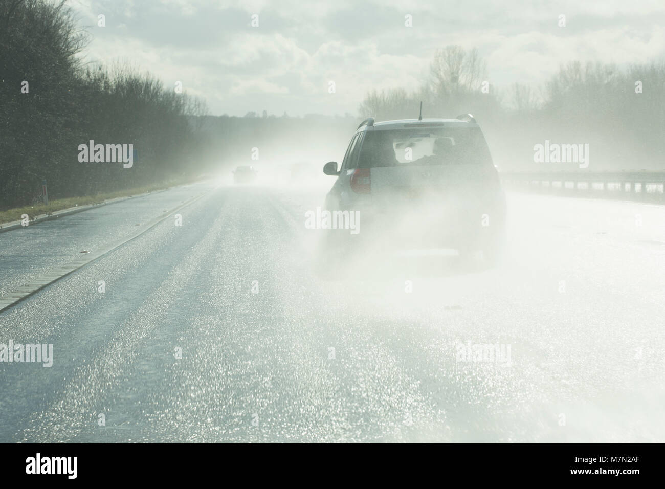 Spray and glare after rain on the M5 motorway southbound in England UK ...