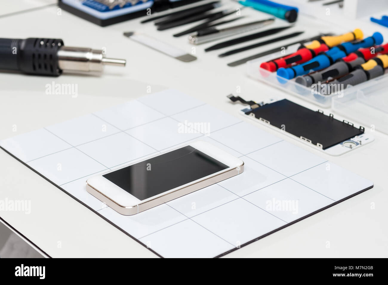 Close-up photos showing process of mobile phone repair Stock Photo - Alamy