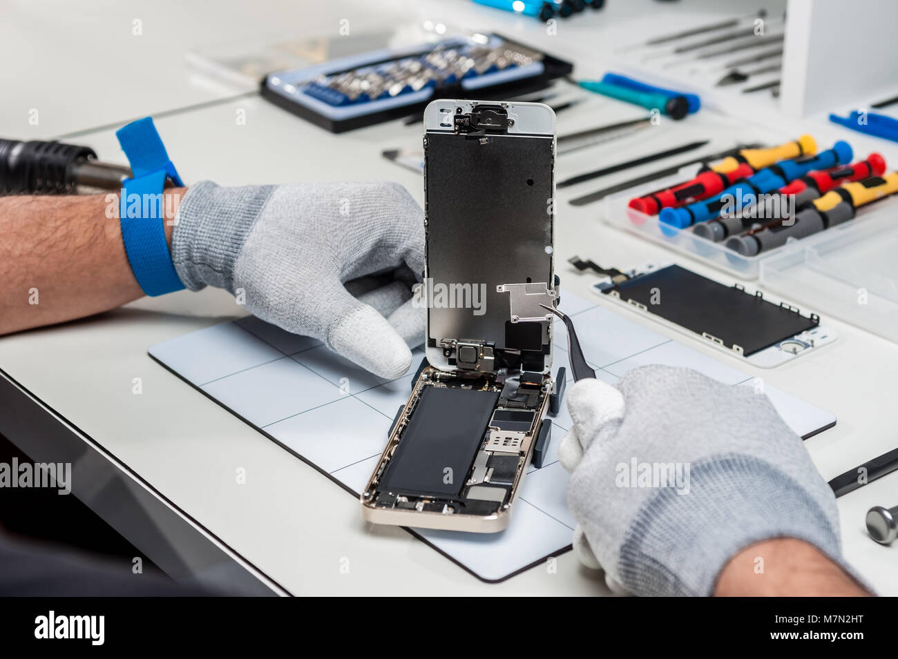 Close-up photos showing process of mobile phone repair Stock Photo - Alamy