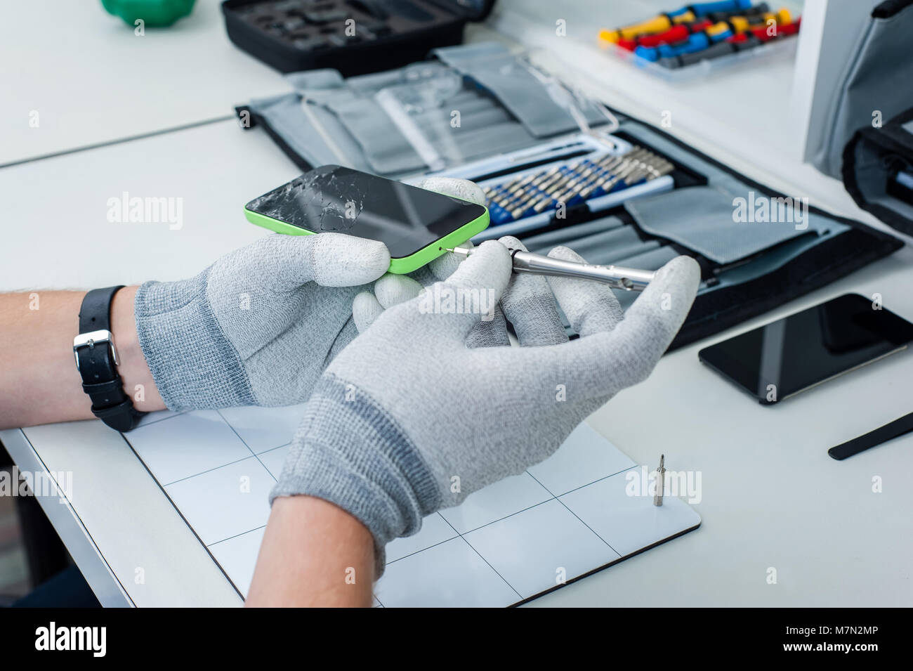 Close-up photos showing process of mobile phone repair Stock Photo - Alamy