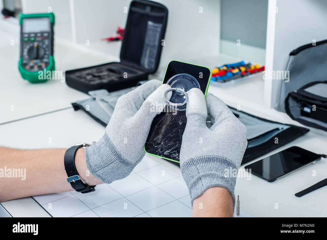 Close-up photos showing process of mobile phone repair Stock Photo - Alamy