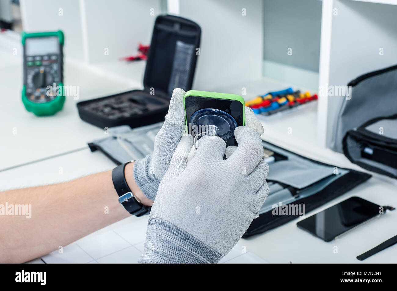 Close-up photos showing process of mobile phone repair Stock Photo - Alamy