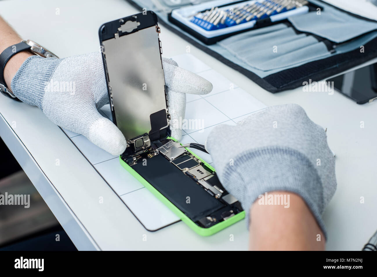 Close-up photos showing process of mobile phone repair Stock Photo - Alamy