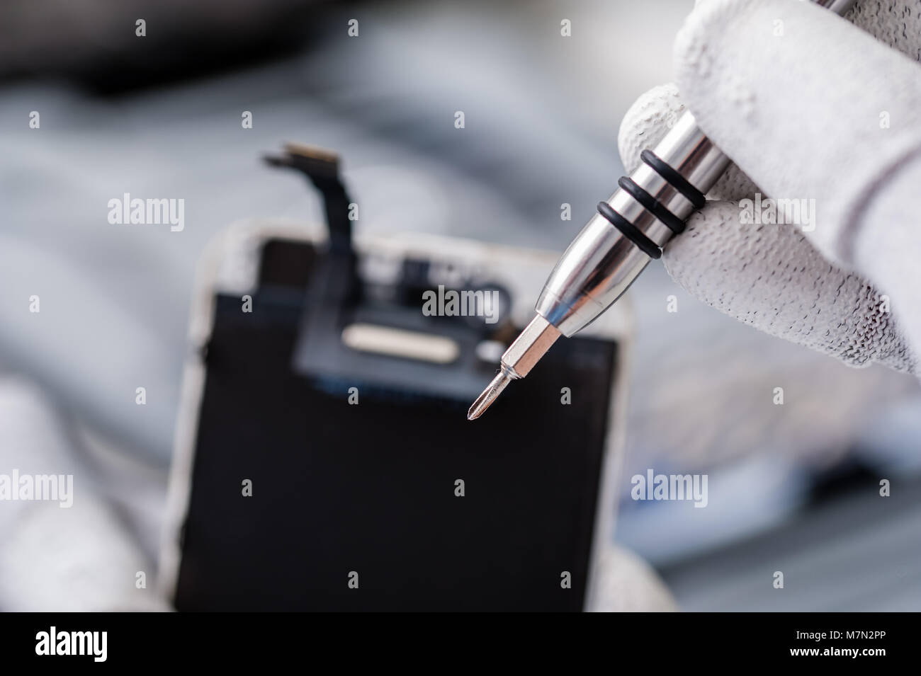 Close-up photos showing process of mobile phone repair Stock Photo - Alamy
