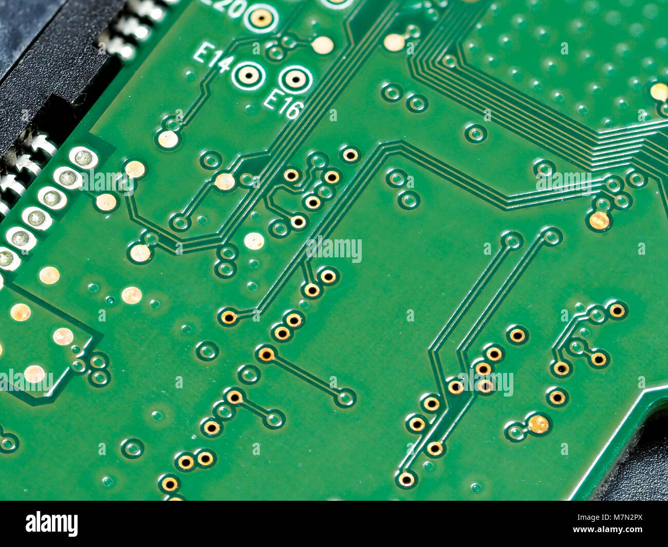 Closeup of green computer mother board, electronic elements and circuit ...
