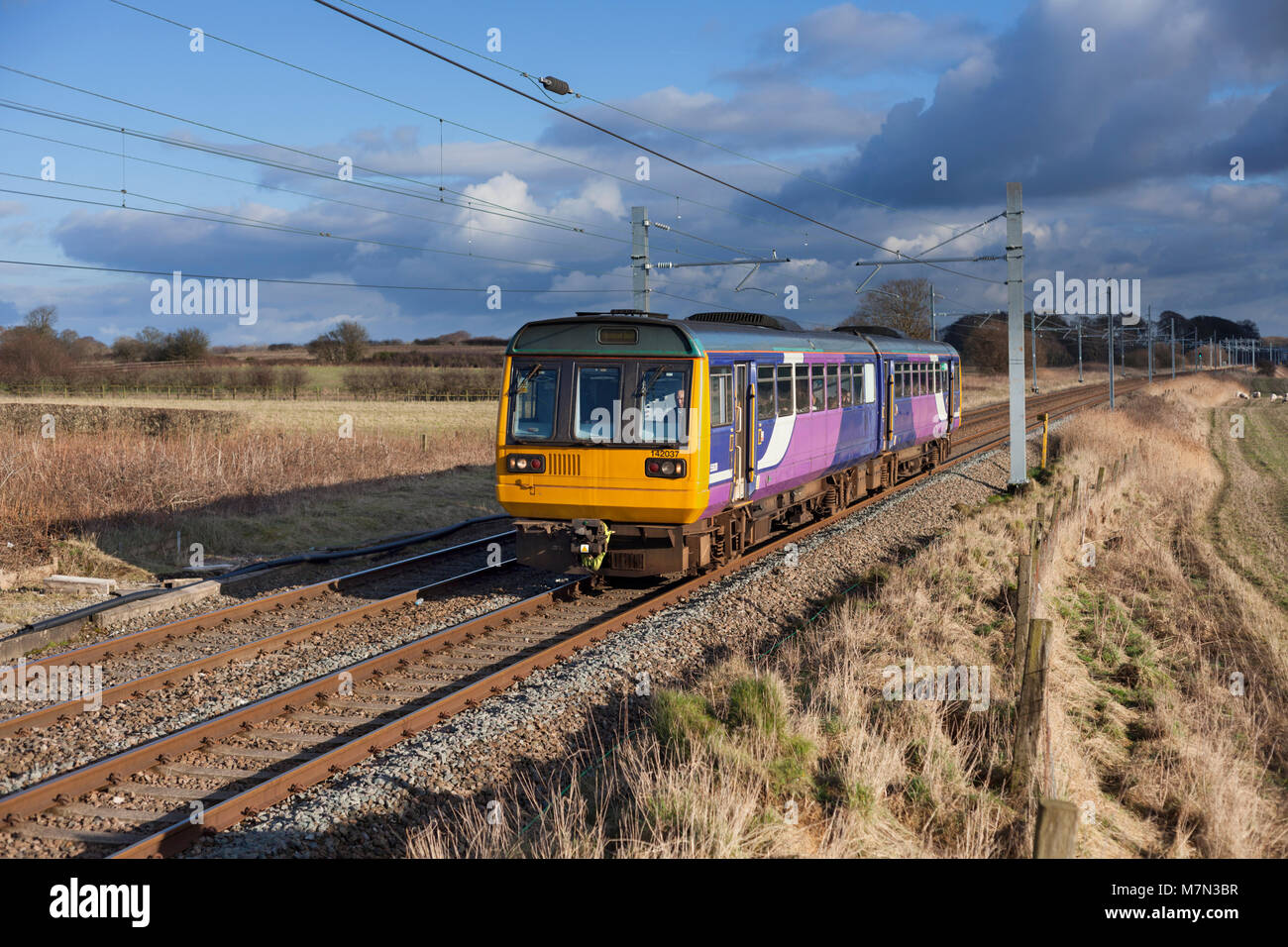 A Northern rail class 142 pacer train passes Treales (west of Salwick ...