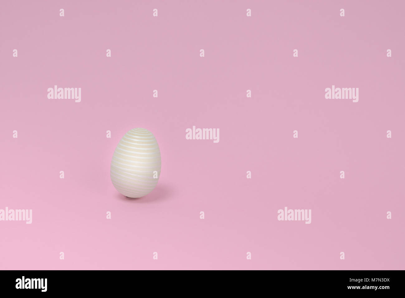 One egg on solid background Stock Photo - Alamy
