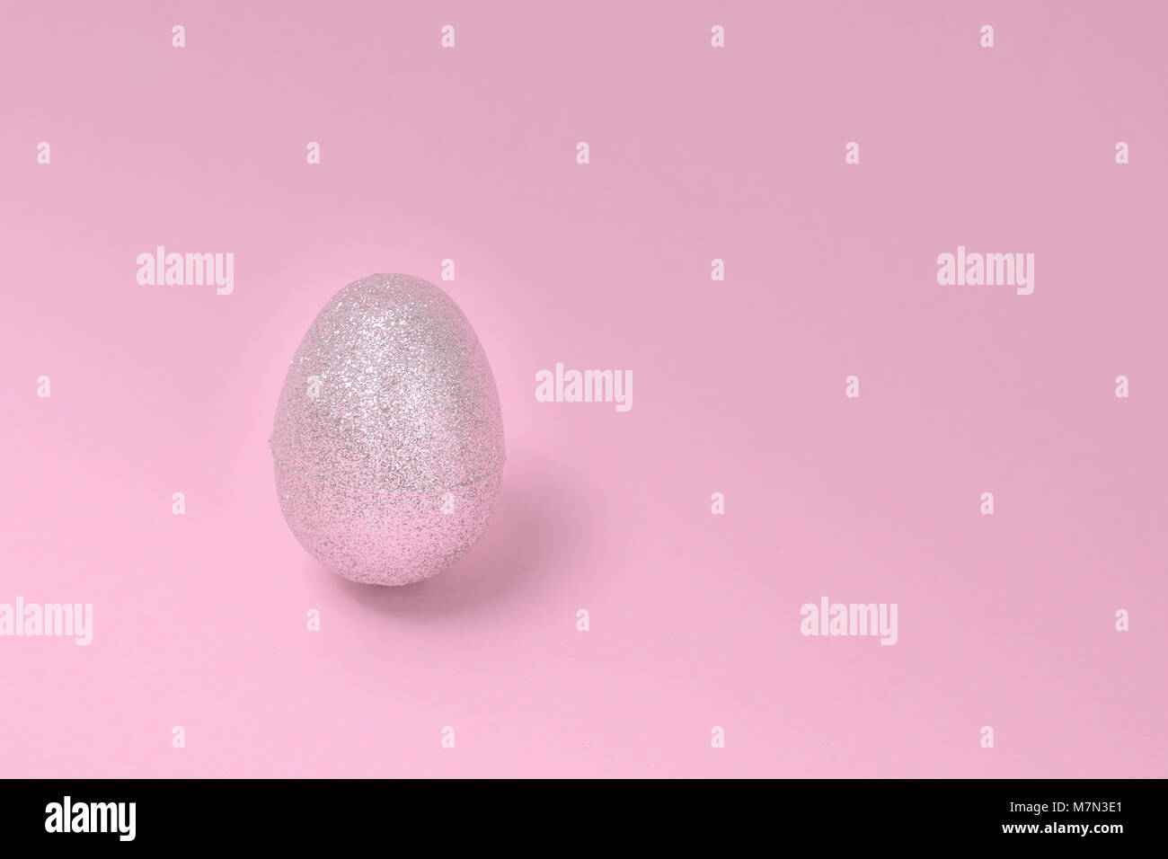 One egg on solid background Stock Photo - Alamy