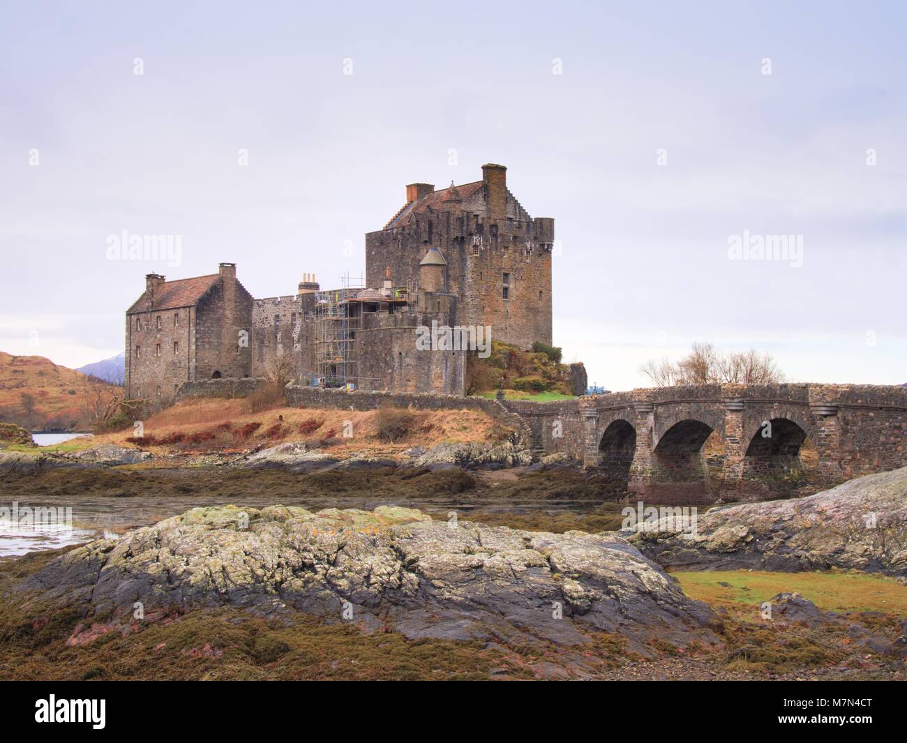 Old Castle with a stone bridge above the water, Scotland, It was ...