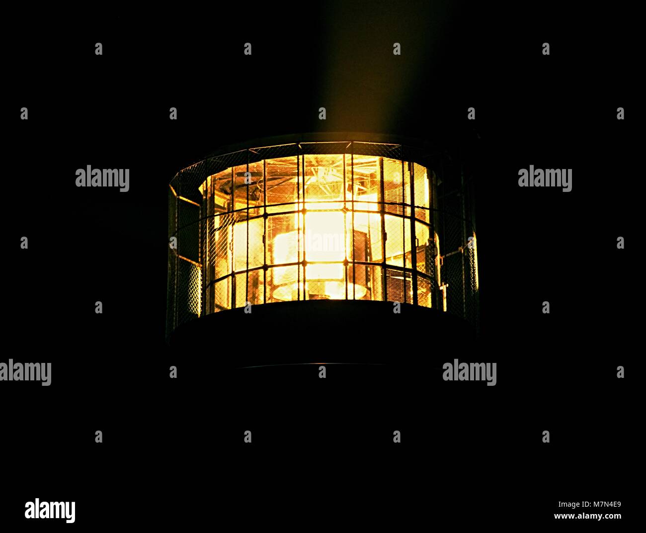 Detail of turning lamp in lighthouse. Detail of Fresnel lens. Tower ...