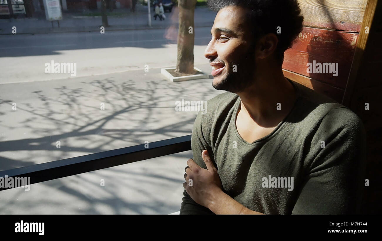 Young bodybuilder wasting time after training Stock Photo - Alamy