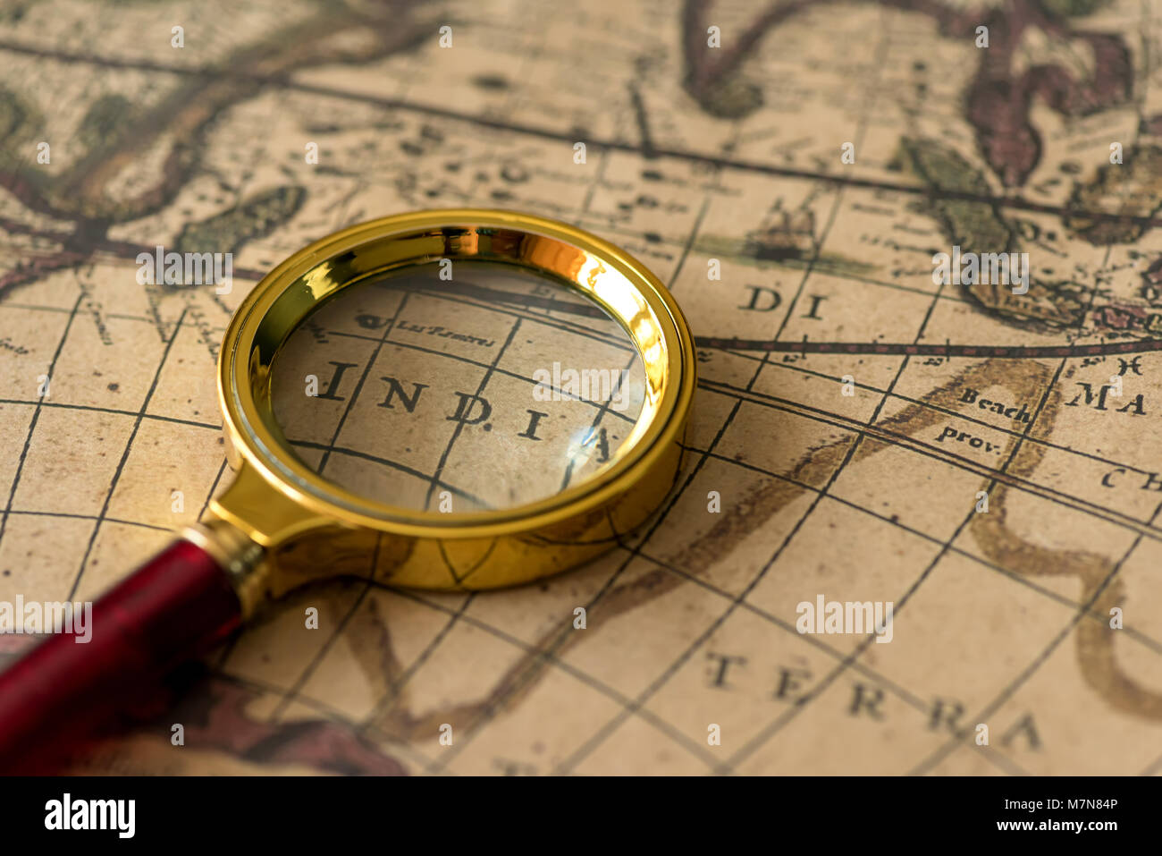 Magnifier on treasure map hi-res stock photography and images - Alamy