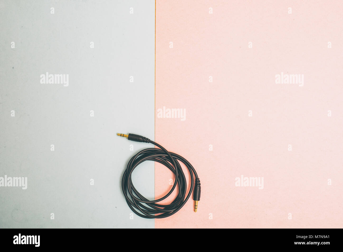 Folded wire on a table top pastel background Stock Photo - Alamy