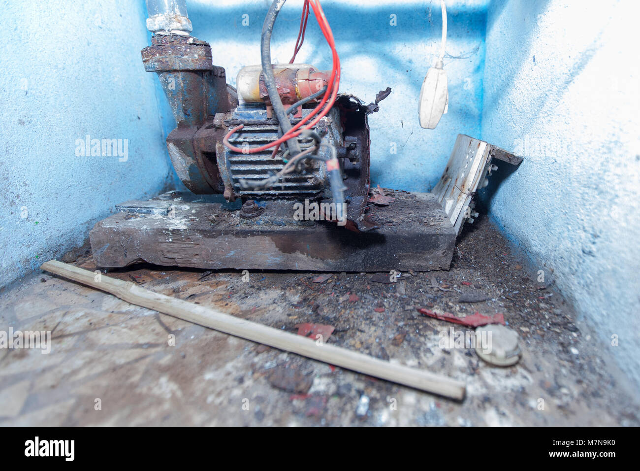 Old metal rusty electric water pump engine Stock Photo - Alamy