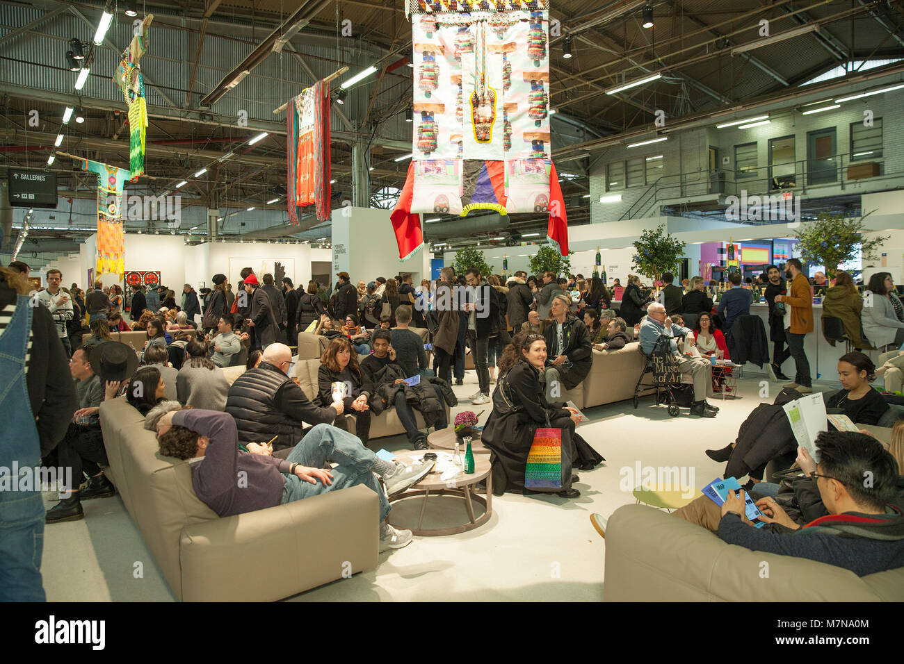 New York, United States. 10th Mar, 2018. Visitors attend lounge at ...