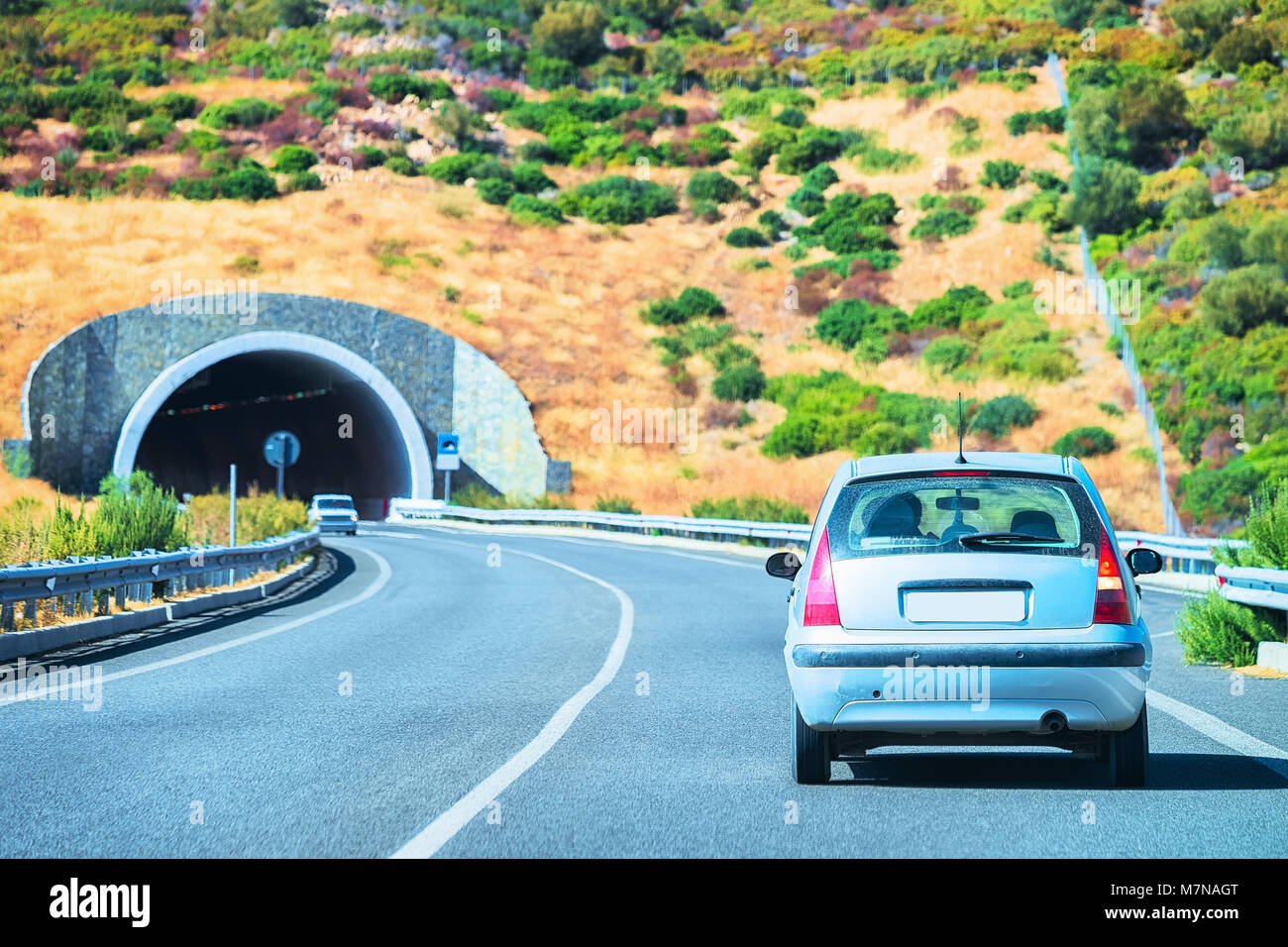 Car on the road with underpass in Cagliari, Sardinia, Italy Stock Photo ...