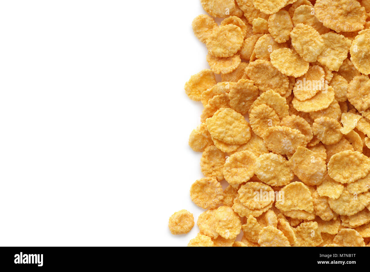 Cornflakes on white background and space for place text Stock Photo - Alamy