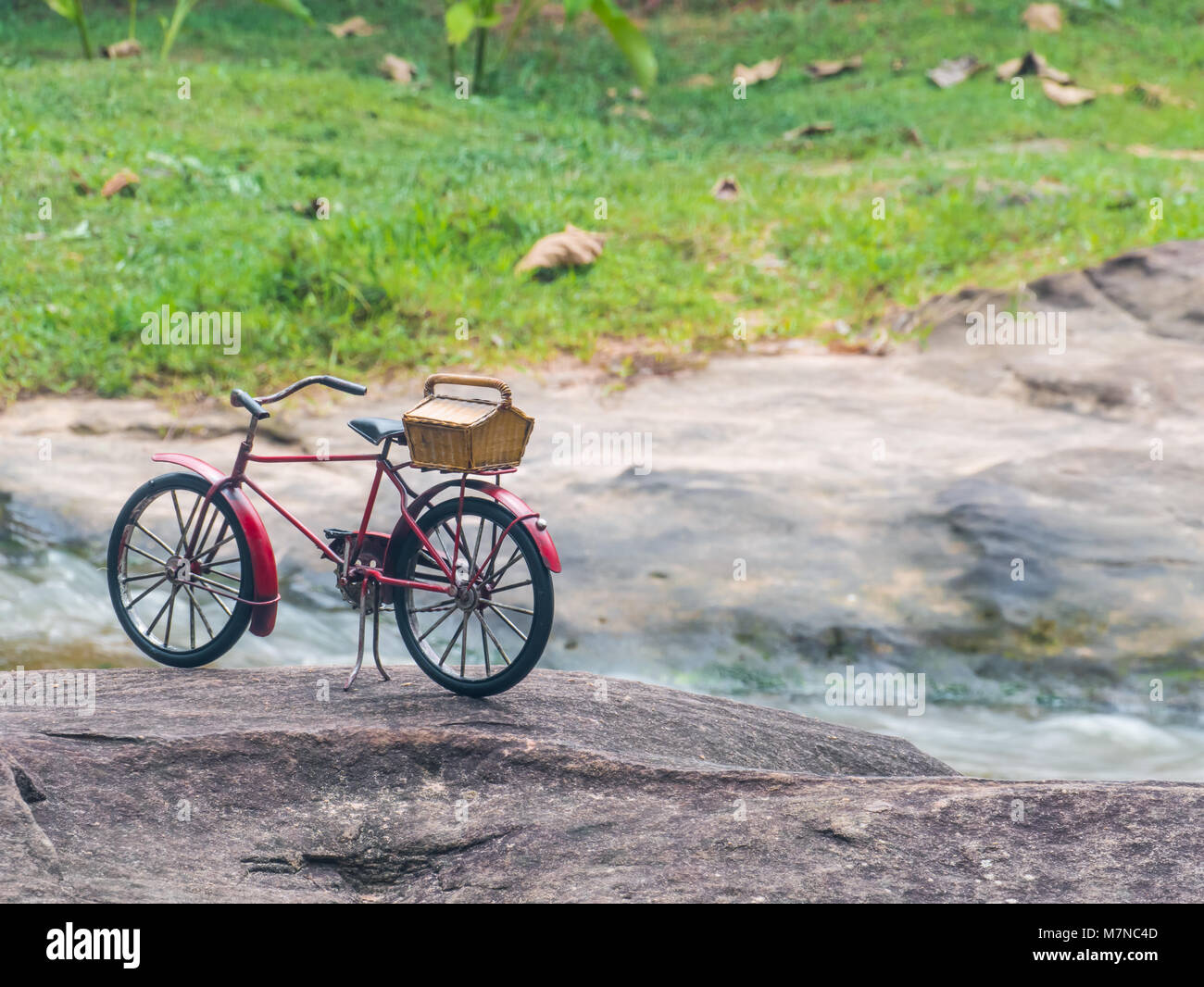 Red bicycle on stone Stock Photo - Alamy