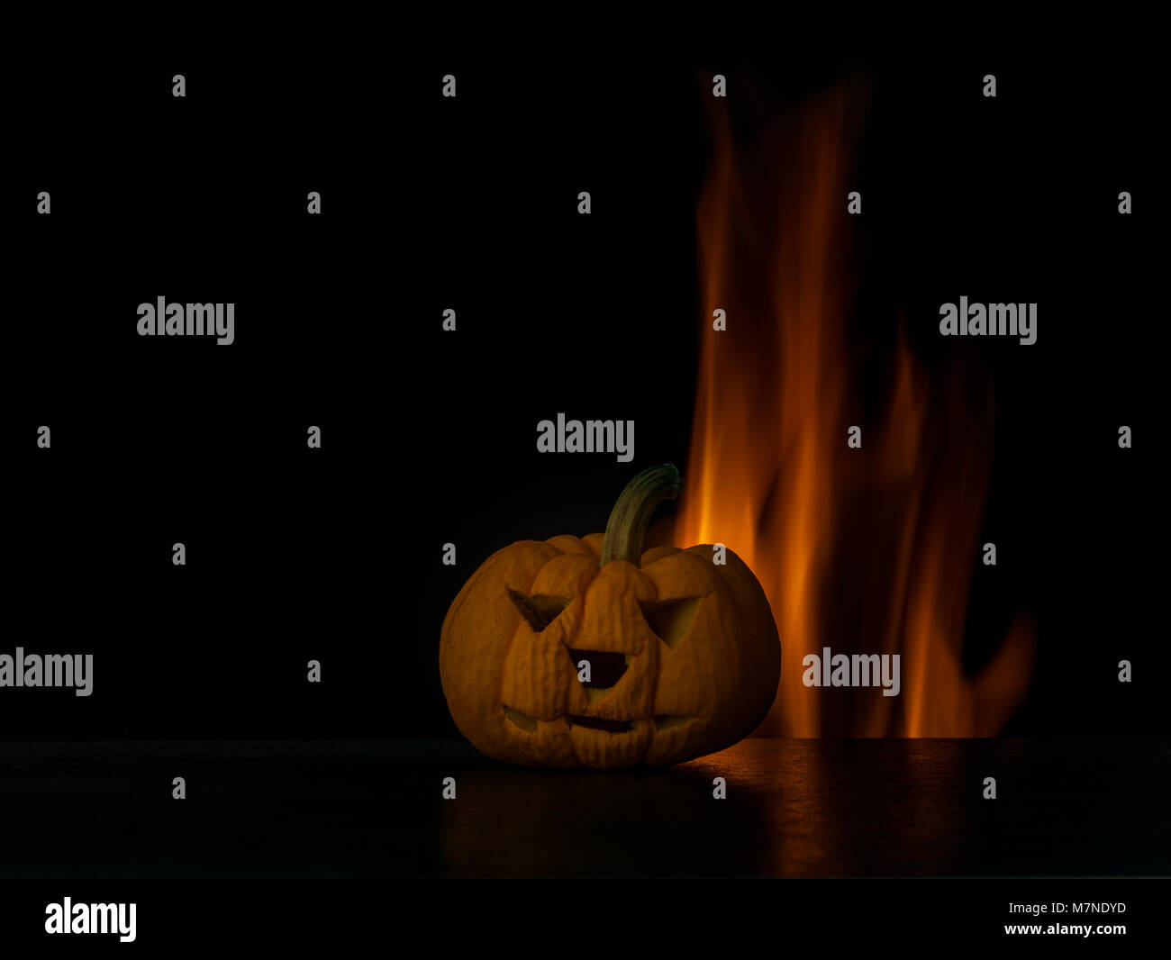 pumpkin on fire background, isolate black background Stock Photo - Alamy