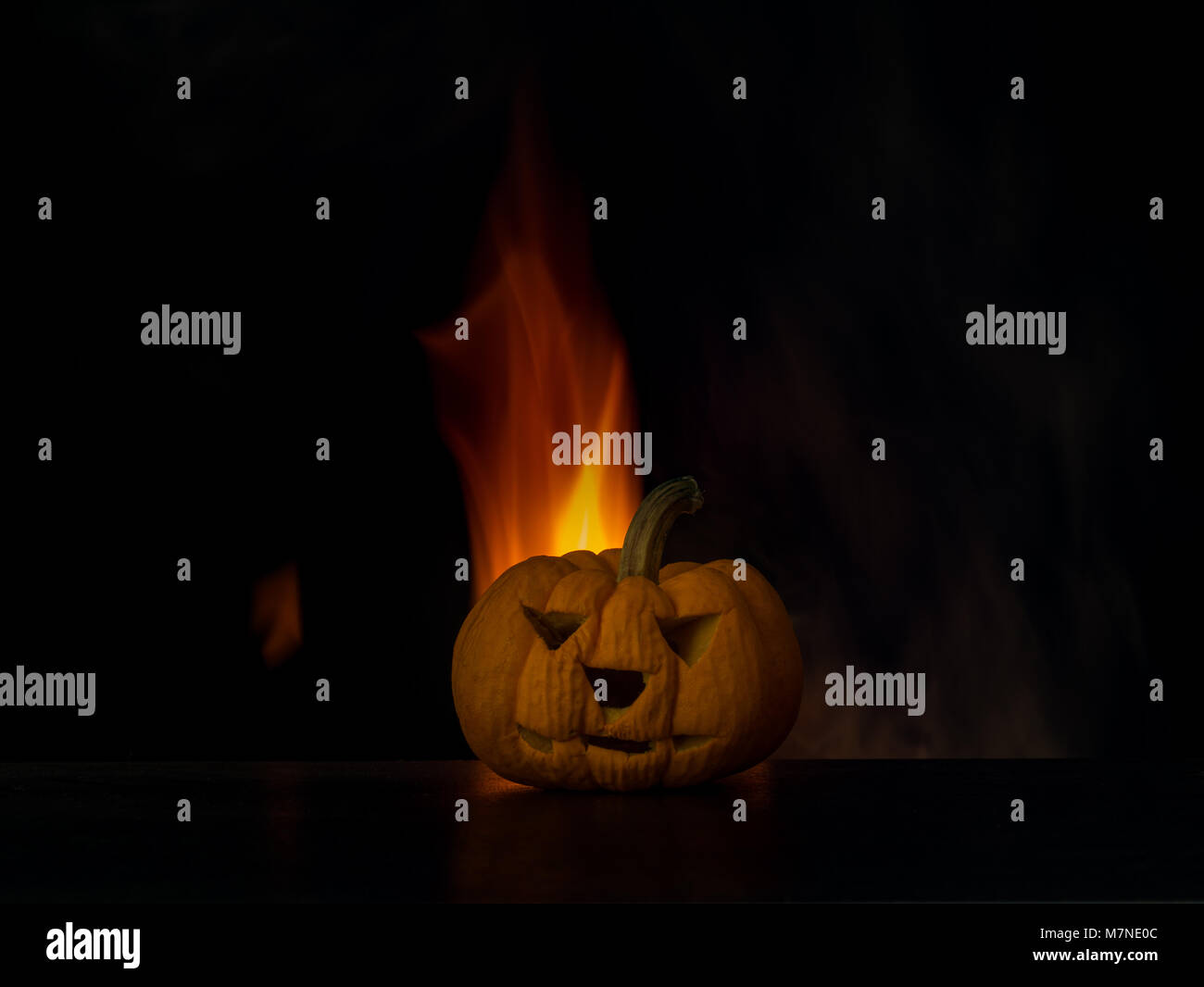 pumpkin on fire background, isolate black background Stock Photo - Alamy