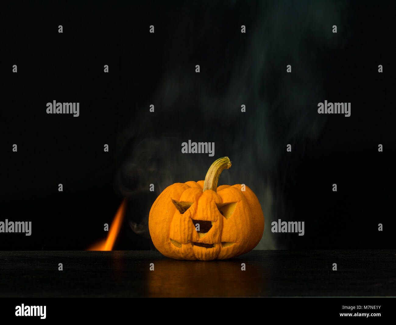 pumpkin on fire background, isolate black background Stock Photo - Alamy