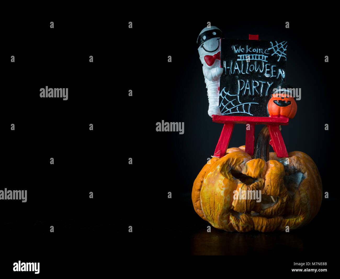 Welcome halloween party notice board on black background, pumpkin front ...