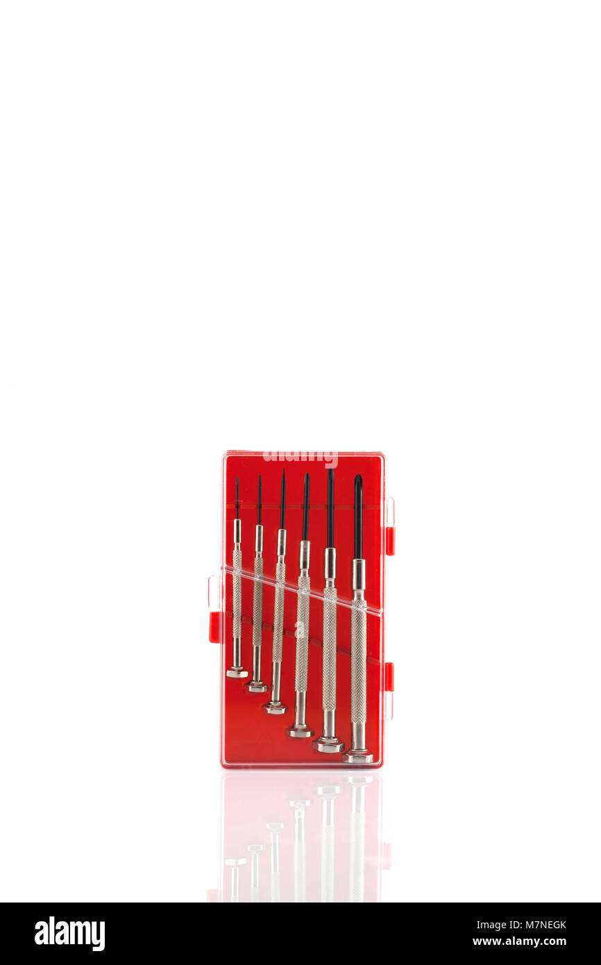 Screwdriver set in red box isolate white background Stock Photo - Alamy