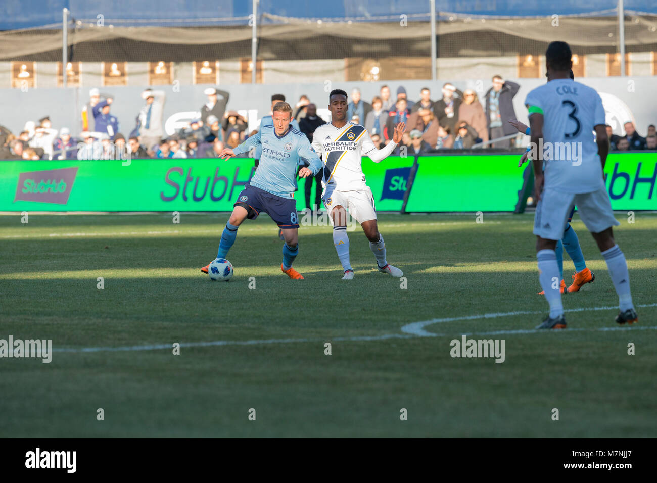 New York, USA. 11th Mar, 2018.Alex Ring (8) of NYC FC controls ball ...
