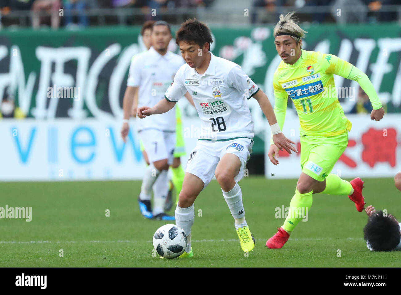 Fukuda Denshi Arena, Chiba, Japan. 11th Mar, 2018. (L to R) Yushi Nagashima (FC Gifu), Takayuki ...