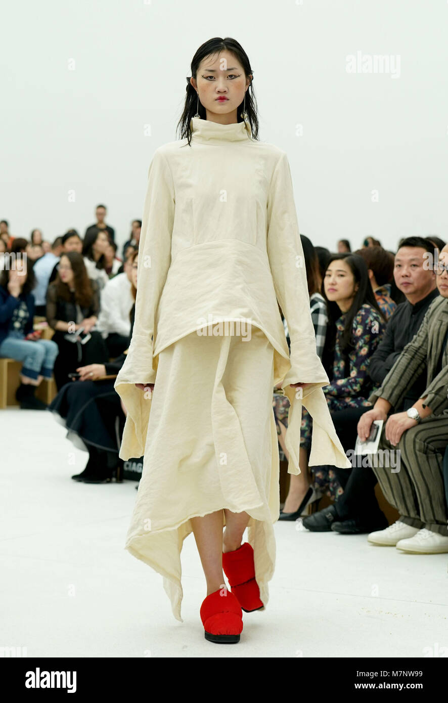 Shenzhen, China's Guangdong Province. 12th Mar, 2018. A model displays ...