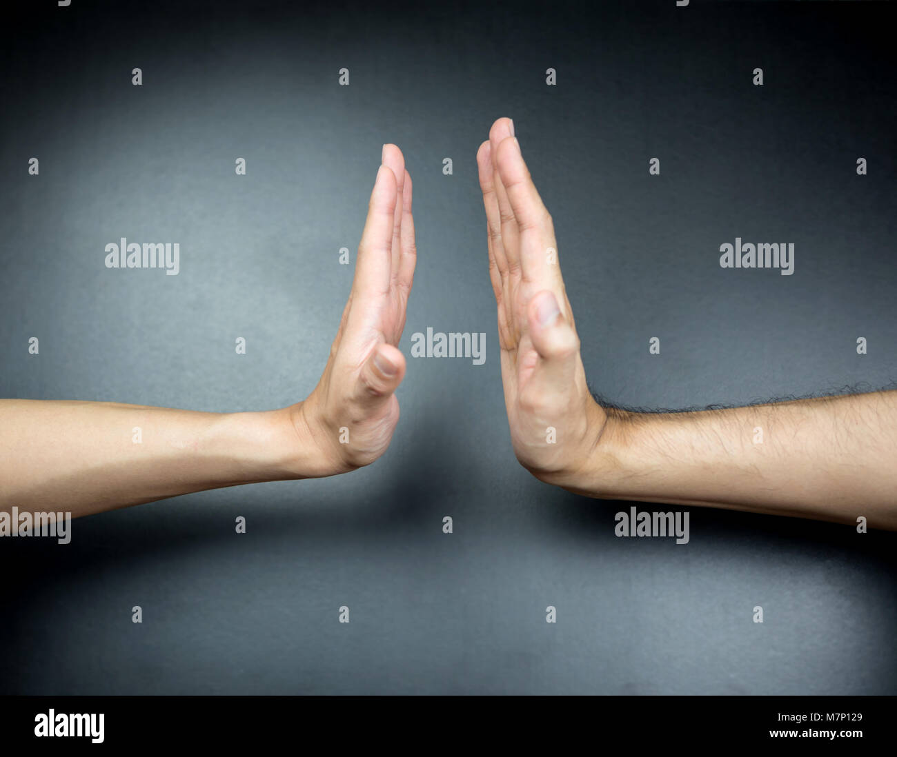 High five, hand gesture on black background Stock Photo - Alamy