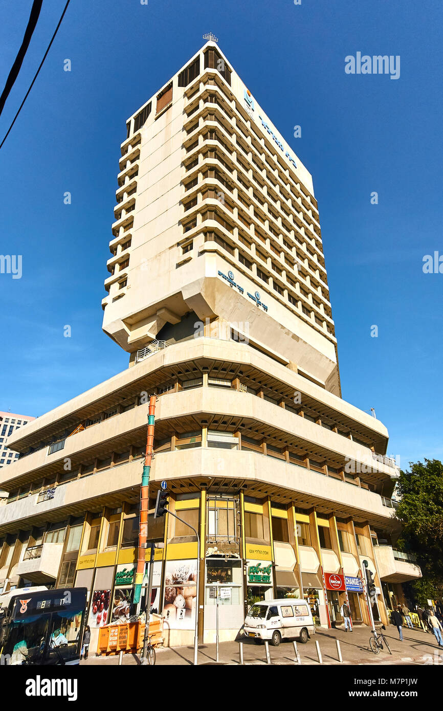 a modernist apartment building against a blue sky in tel aviv israel ...