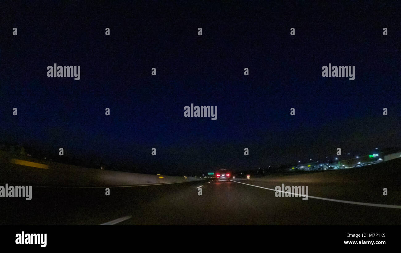 Driving on Interstate highway I25 at night Stock Photo - Alamy
