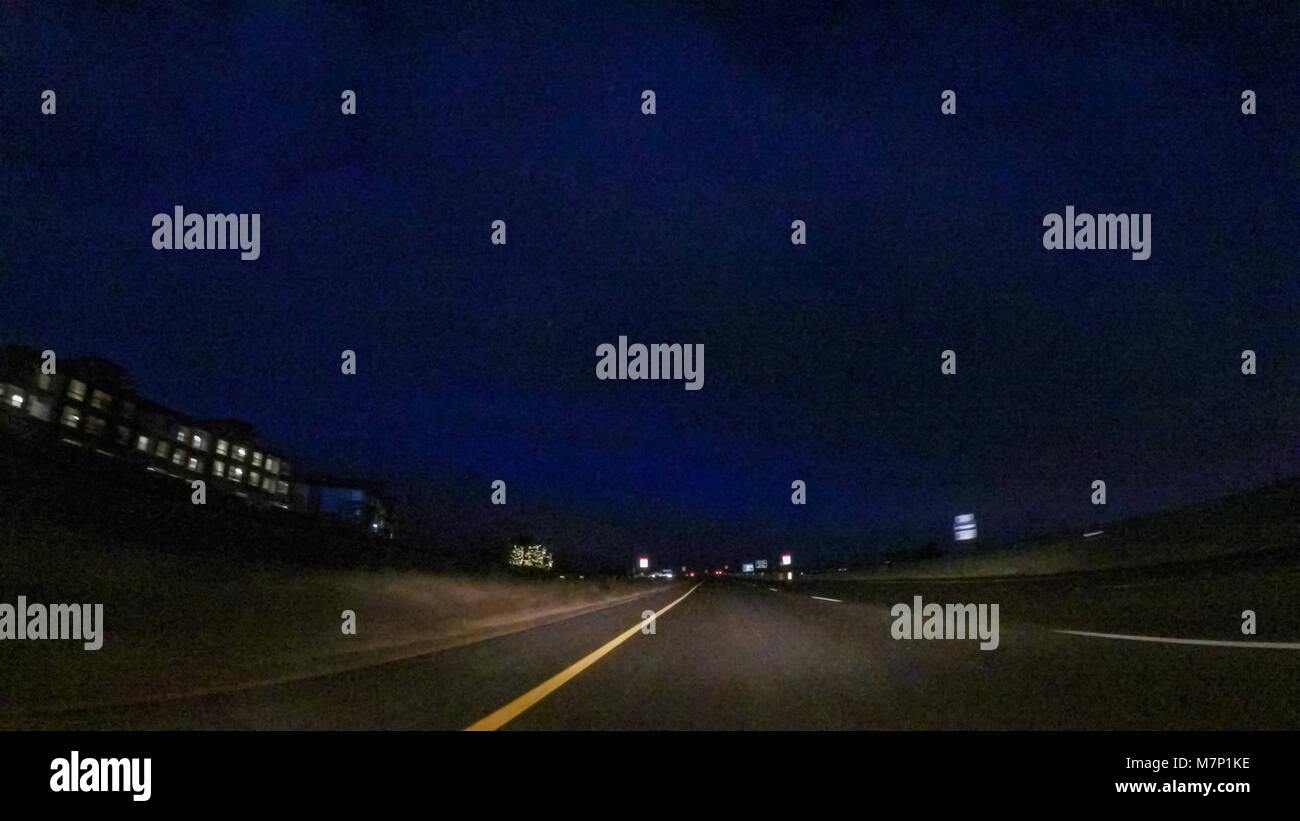 Driving on Interstate highway I25 at night Stock Photo - Alamy