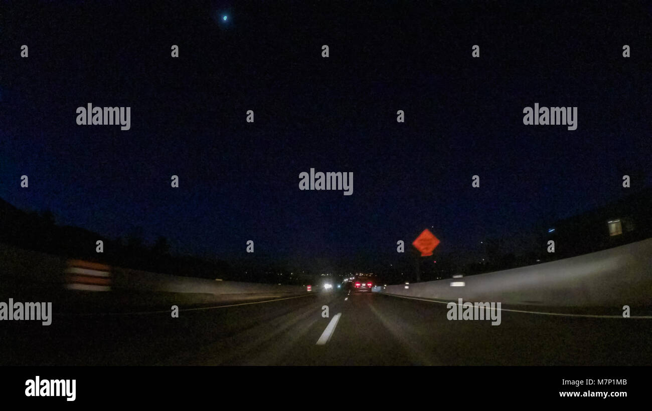 Driving on Interstate highway I25 at night Stock Photo - Alamy