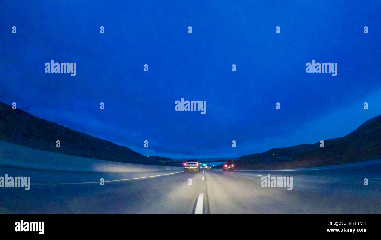 Driving on Interstate highway I25 at night Stock Photo - Alamy