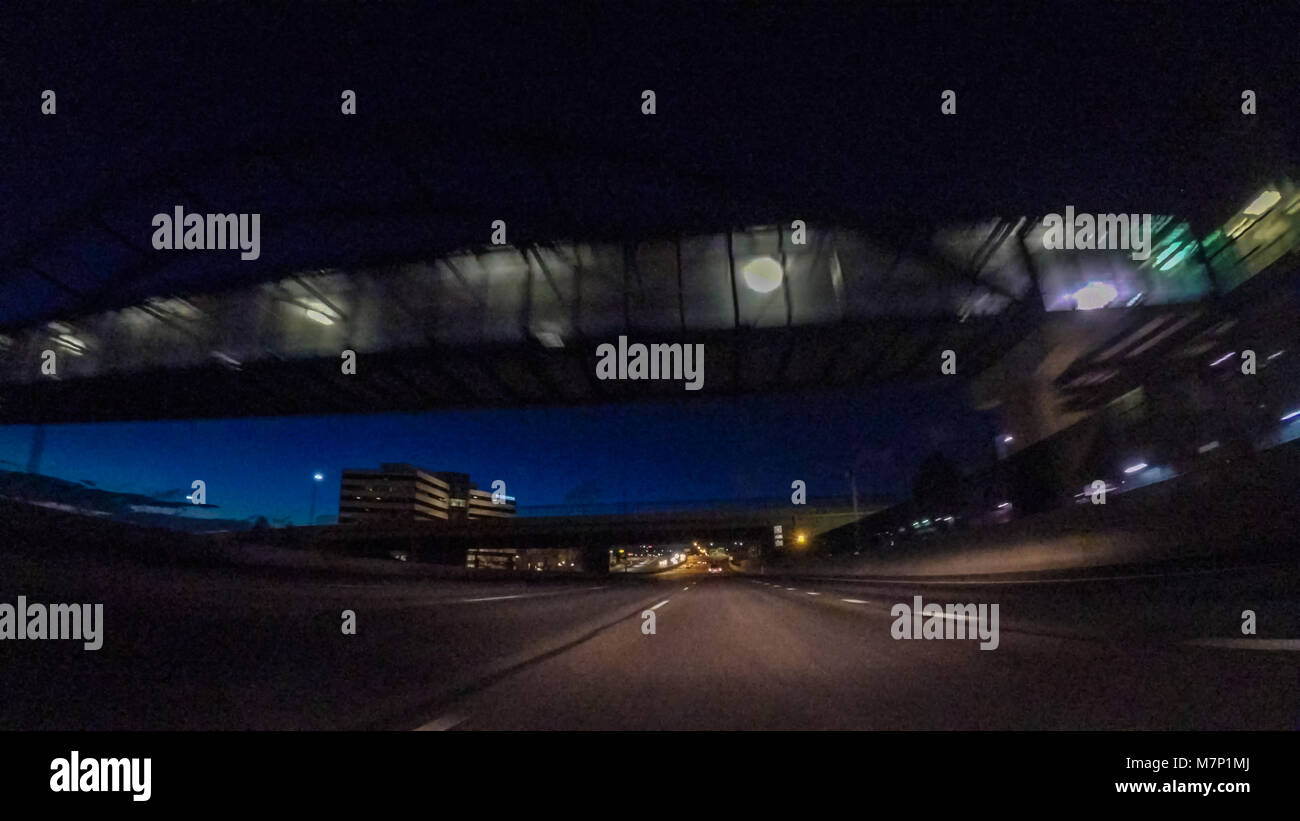 Driving on Interstate highway I25 at night Stock Photo - Alamy