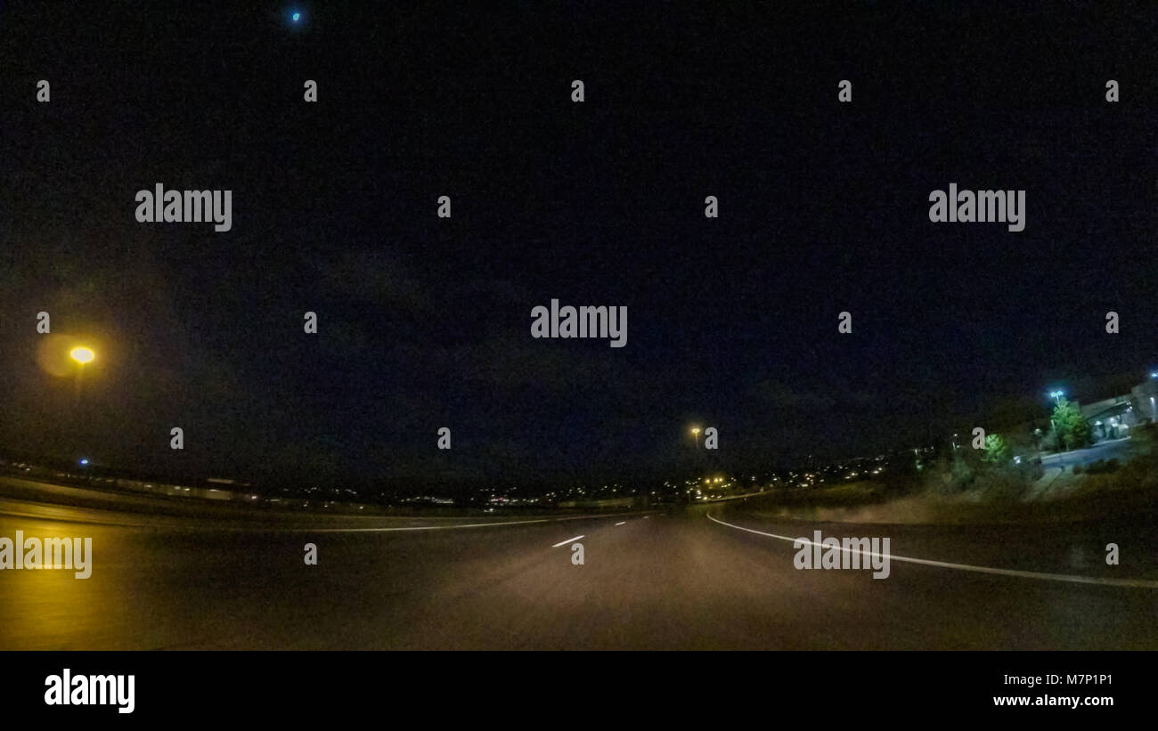 Driving on Interstate highway I25 at night Stock Photo - Alamy