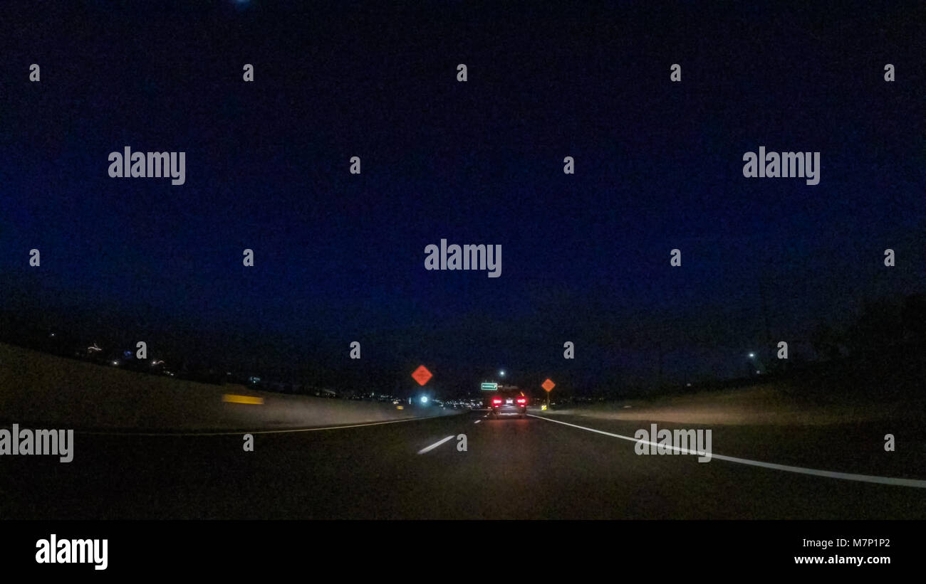 Driving on Interstate highway I25 at night Stock Photo - Alamy