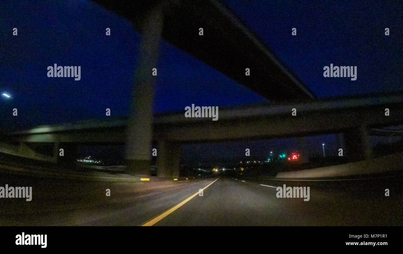 Driving on Interstate highway I25 at night Stock Photo - Alamy