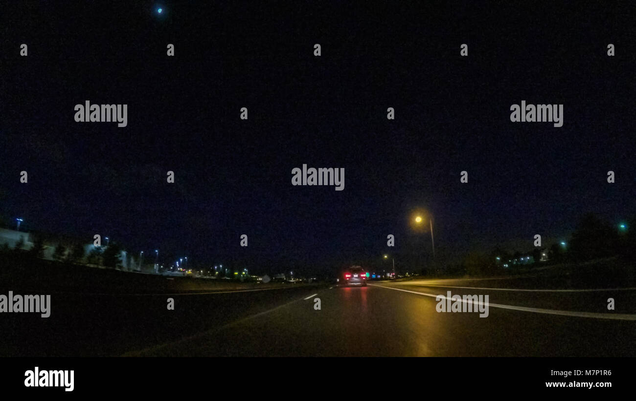 Driving on Interstate highway I25 at night Stock Photo - Alamy
