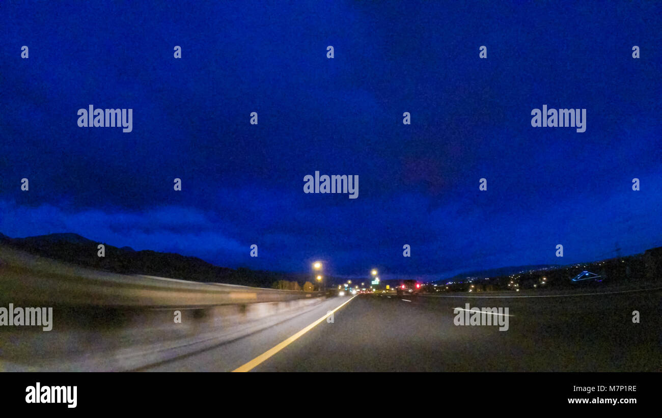 Driving on Interstate highway I25 at night Stock Photo - Alamy