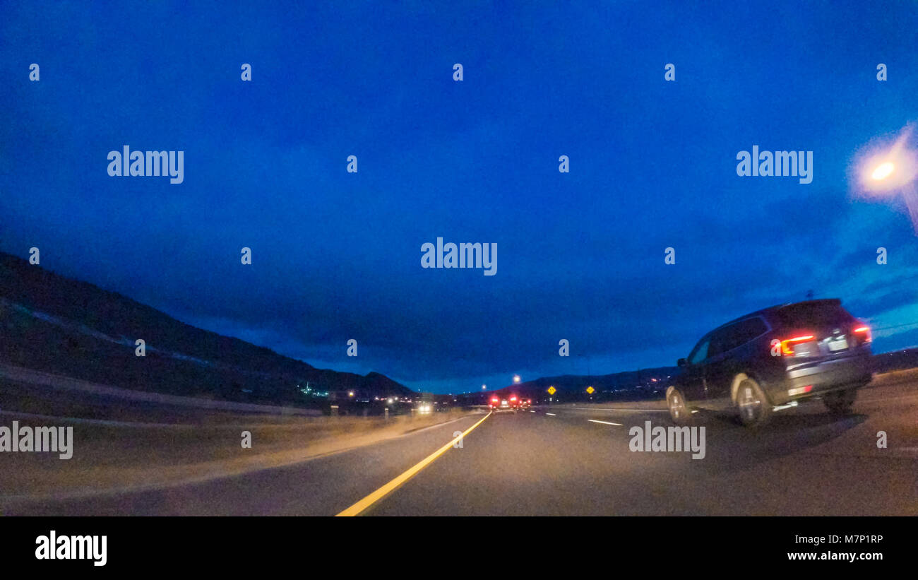 Driving on Interstate highway I25 at night Stock Photo - Alamy
