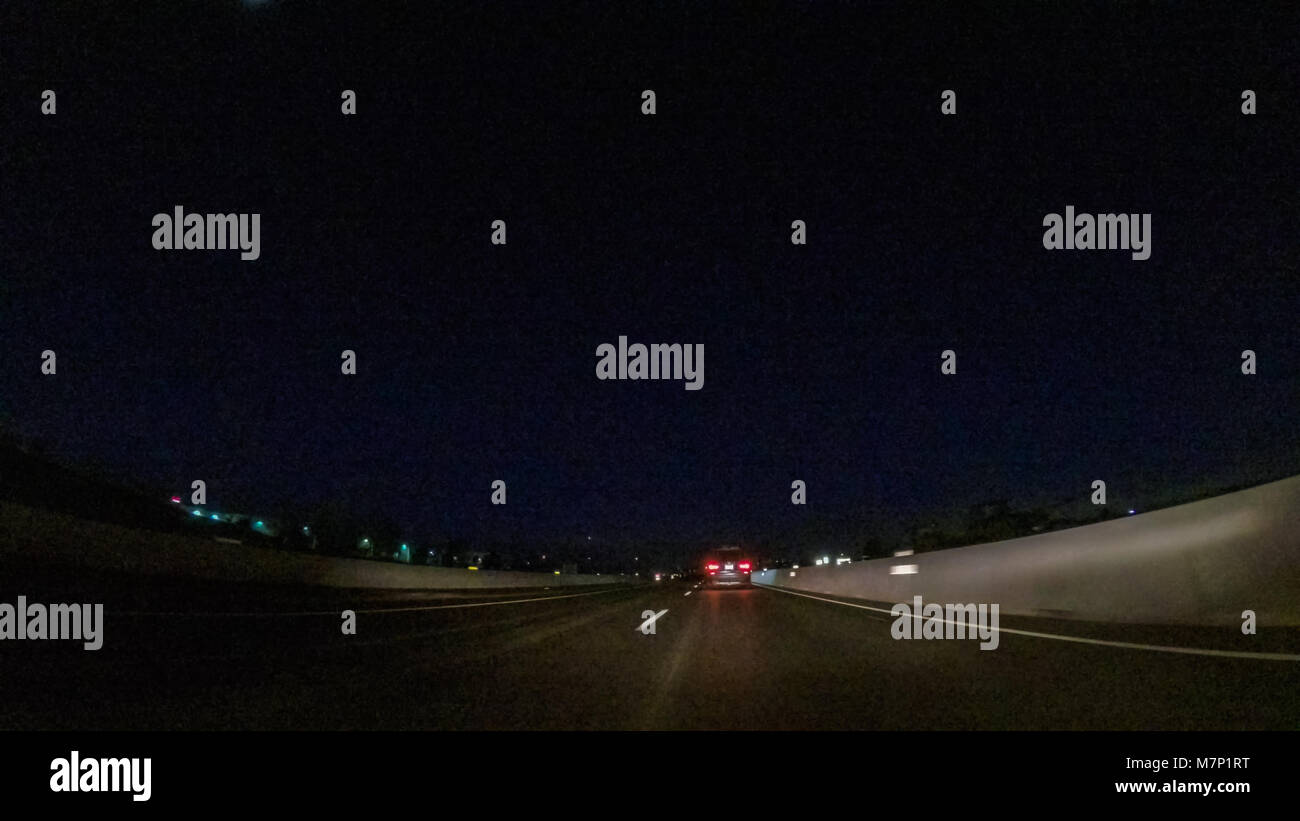 Driving on Interstate highway I25 at night Stock Photo - Alamy