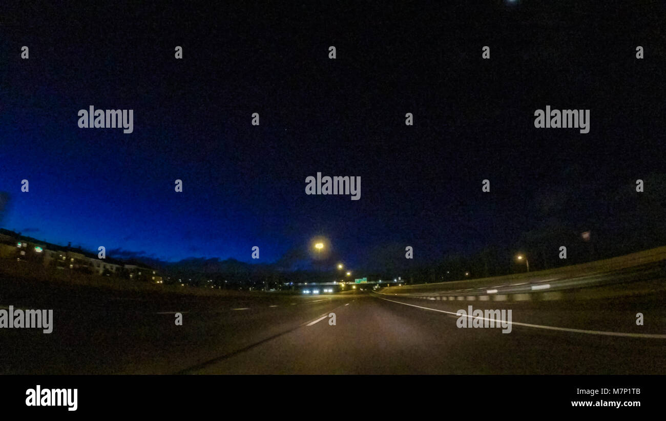 Driving on Interstate highway I25 at night Stock Photo - Alamy