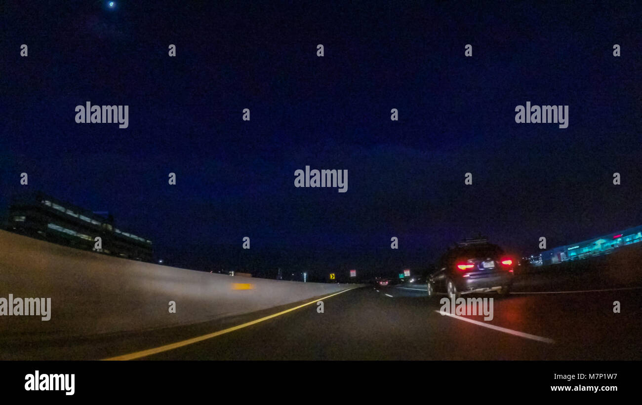 Driving on Interstate highway I25 at night Stock Photo - Alamy