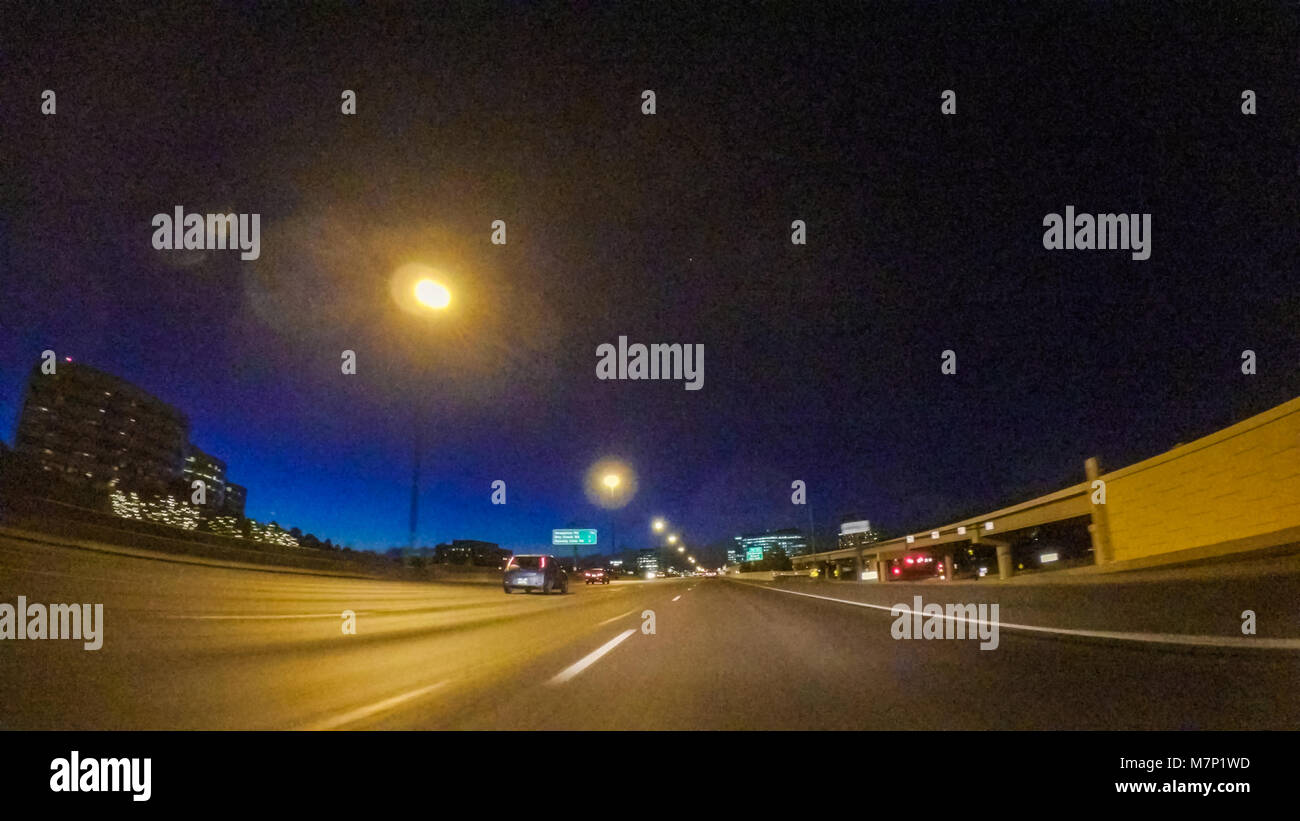 Driving on Interstate highway I25 at night Stock Photo - Alamy
