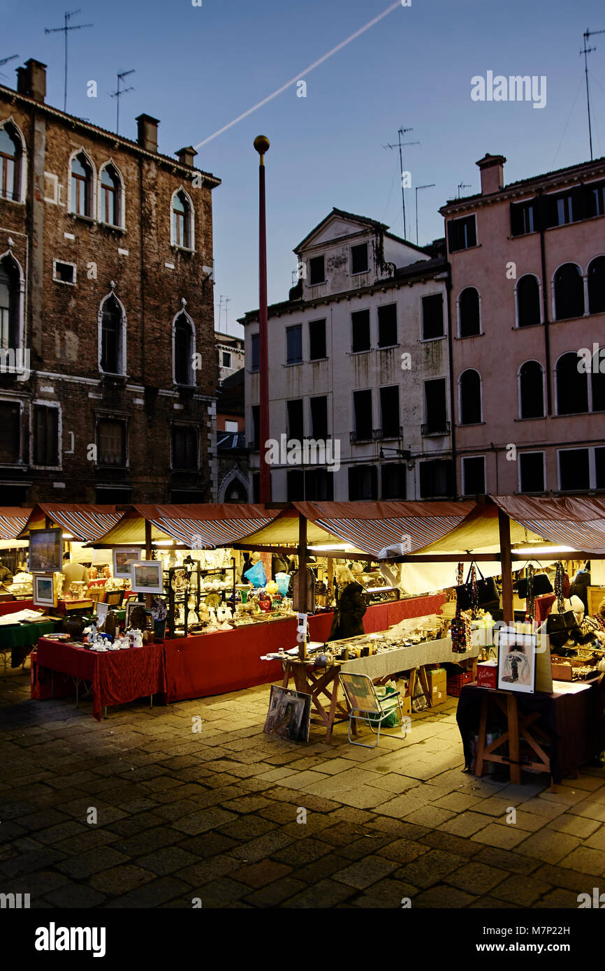 street market at night in a square in venice italy Stock Photo - Alamy