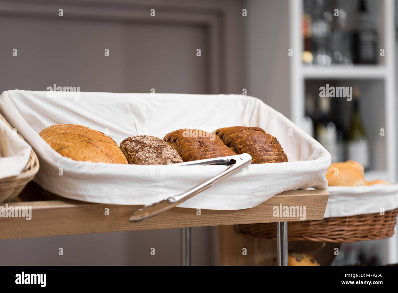 Fresh bread in wicker baskets in the hotel's buffet Stock Photo - Alamy
